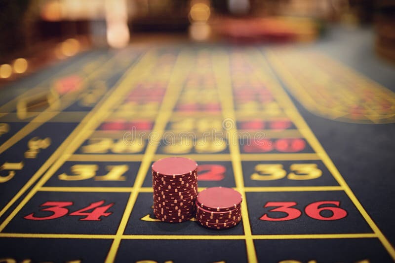 Roulette Chips on a Gaming Table in a Casino. Stock Photo - Image of ...