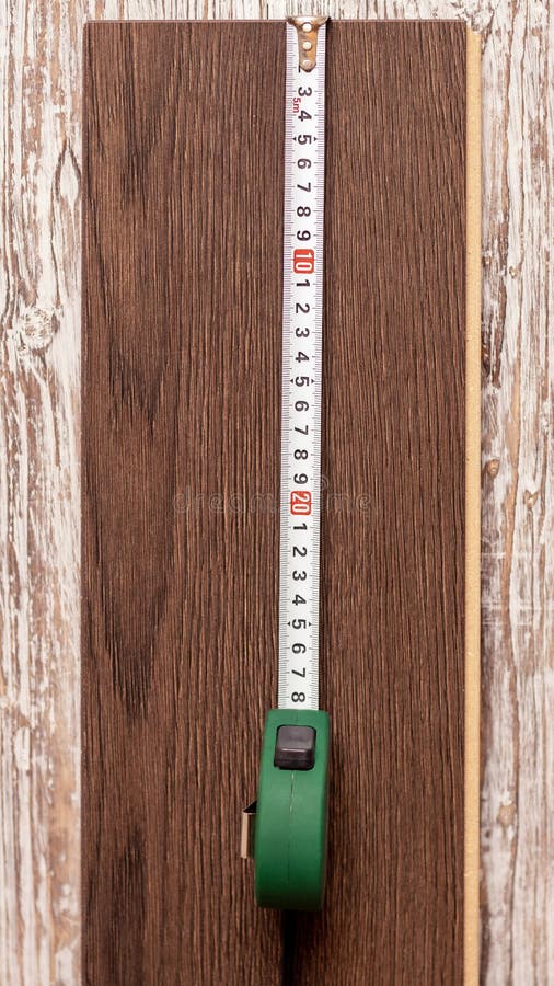 Roulette Near the Board, Measuring the Length of the Board Stock Image ...