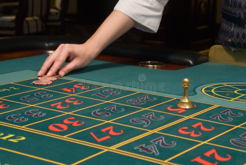 Roulette table in casino stock photo. Image of leisure - 7532700