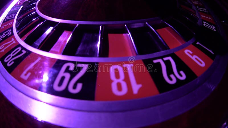 Roulette Wheel Running and Stops with White Ball on Red Stock Footage ...