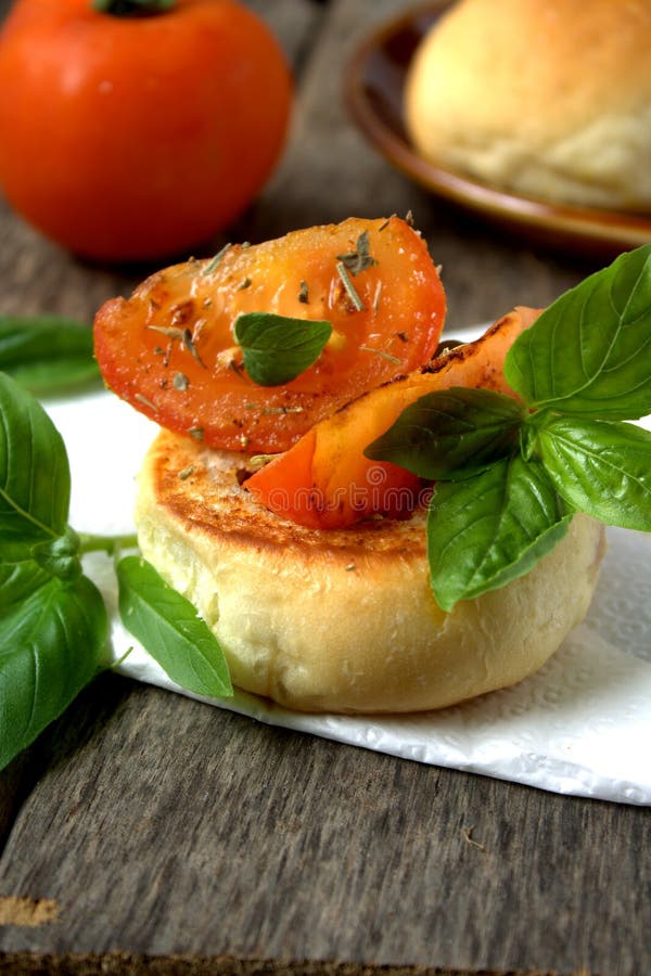 Rounb Bun and Tomatoes Grill Stock Photo - Image of food, pesto: 59810822