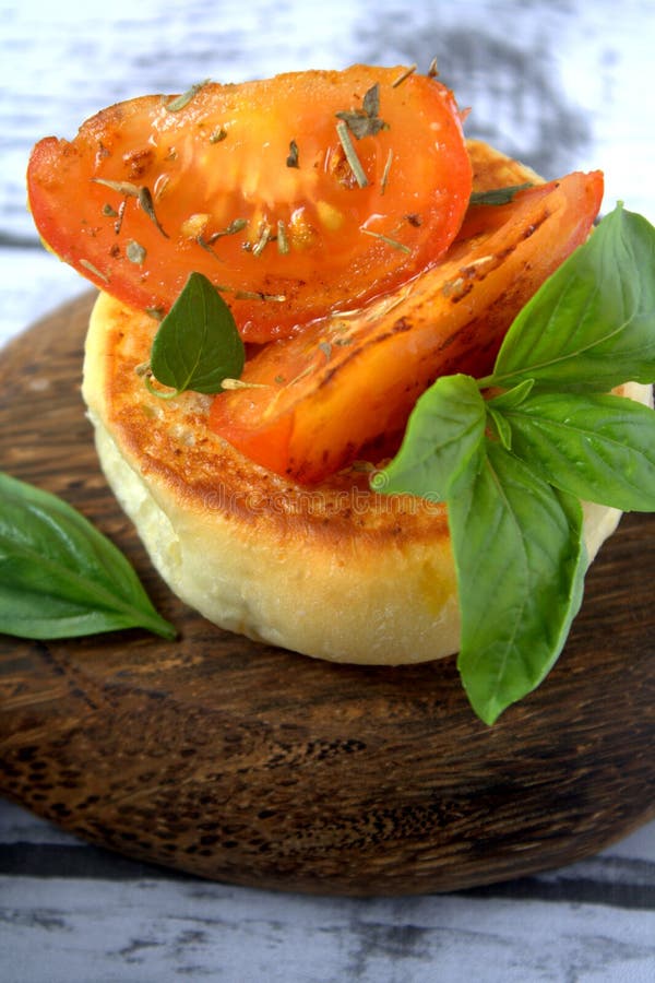 Rounb Bun and Tomatoes Grill Stock Image - Image of crostini, crunchy ...