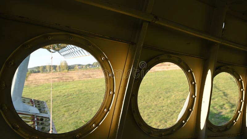 Round Airplane Windows Overlooking Field Stock Photos - Free & Royalty ...