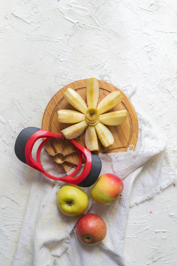 Round Apple Slicer on a Board, Making Eight Segments for Breakfasts ...