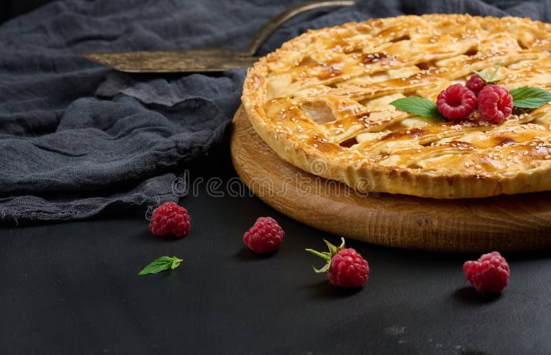 Round Baked Apple Pie on a Black Table Stock Image - Image of seasonal ...