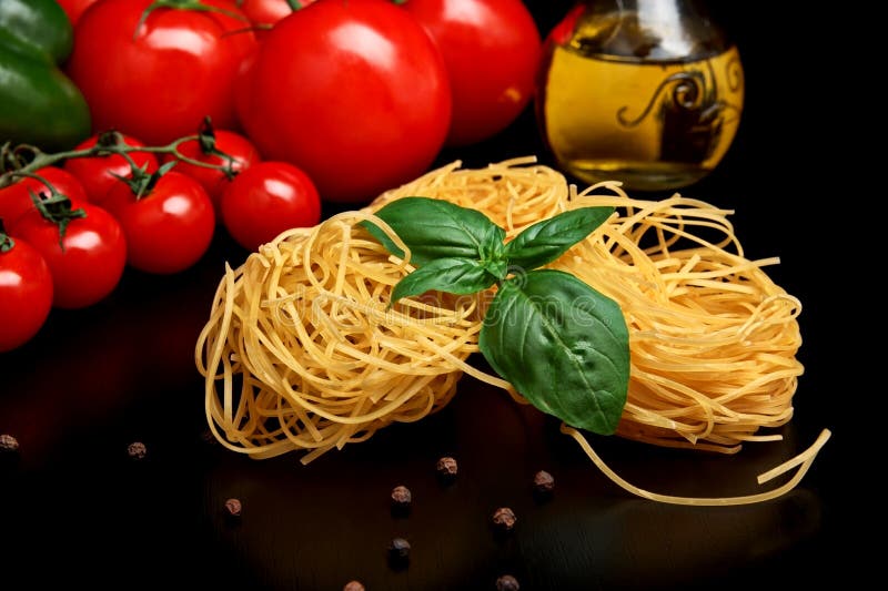 Round Balls of Pasta with Tomatoes,basil,olive Oil on Black Stock Image ...