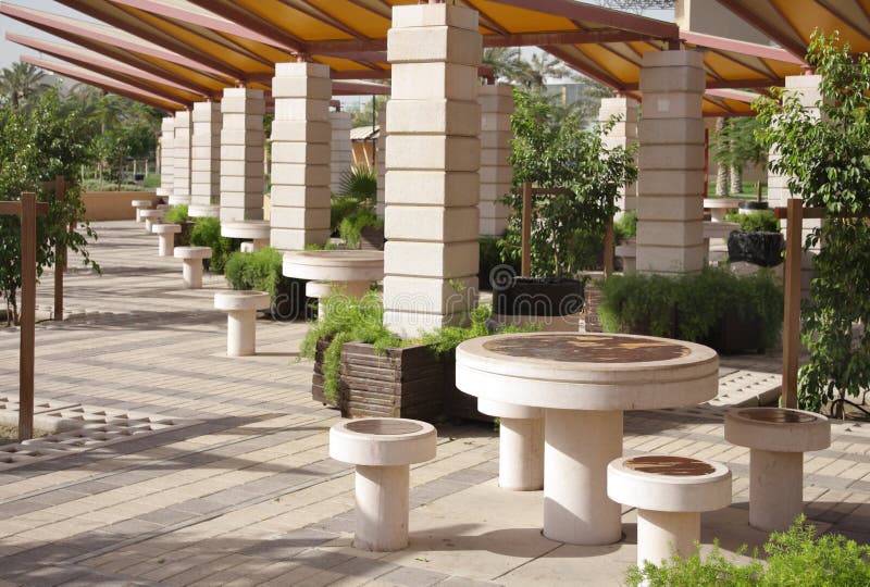 Round Beautiful Table and Chairs in a Garden Stock Photo - Image of ...