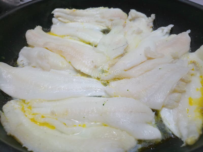 Raw White Fish Frying in Hot Butter Stock Image - Image of butter ...
