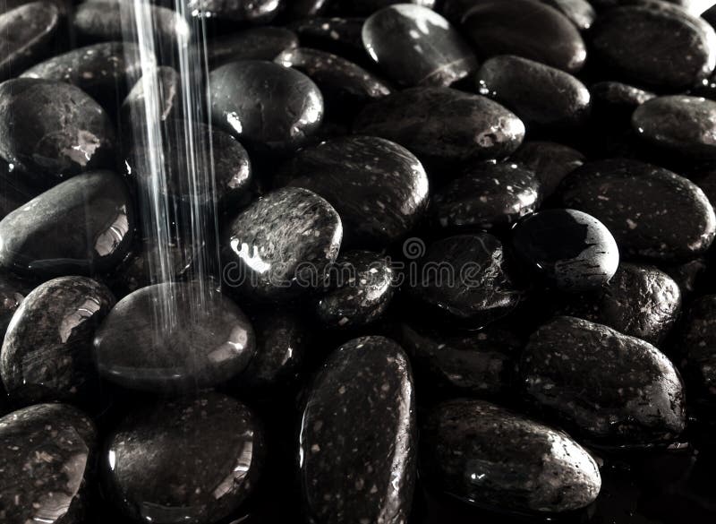 Round Black Stone on Ground beside the Waterfall Stock Image - Image of ...