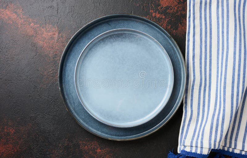 Round Blue Ceramic Empty Plates and Kitchen Towel, Top View Stock ...