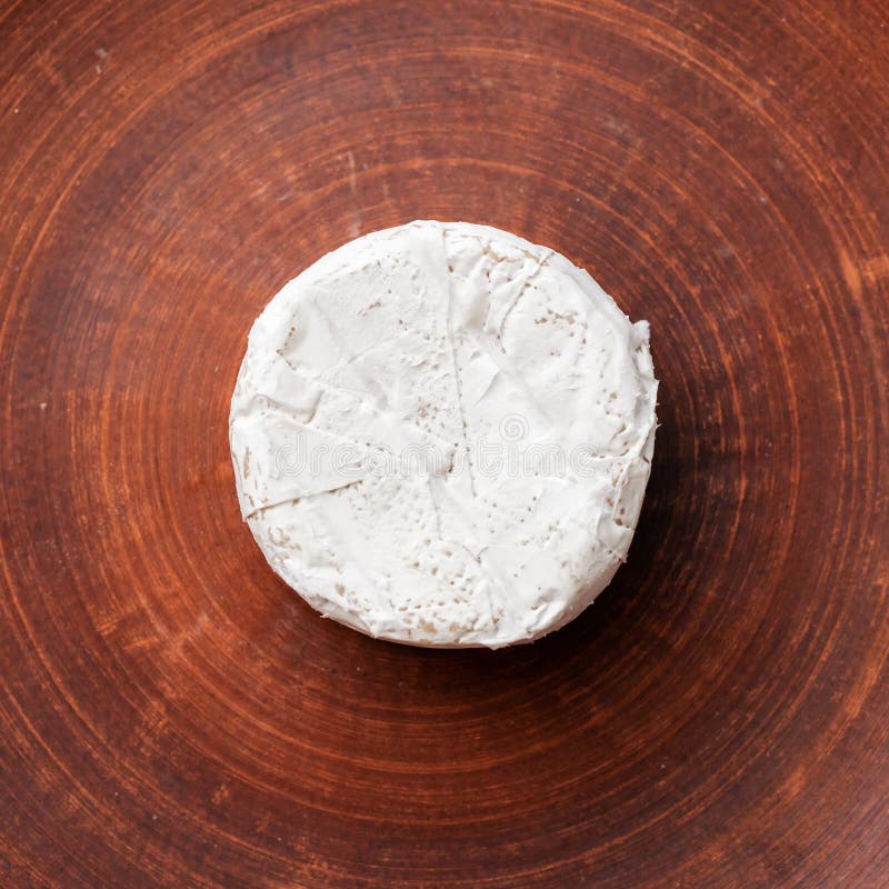 Round Blue Cheese on a Brown Clay Plate. View from Above Stock Image ...