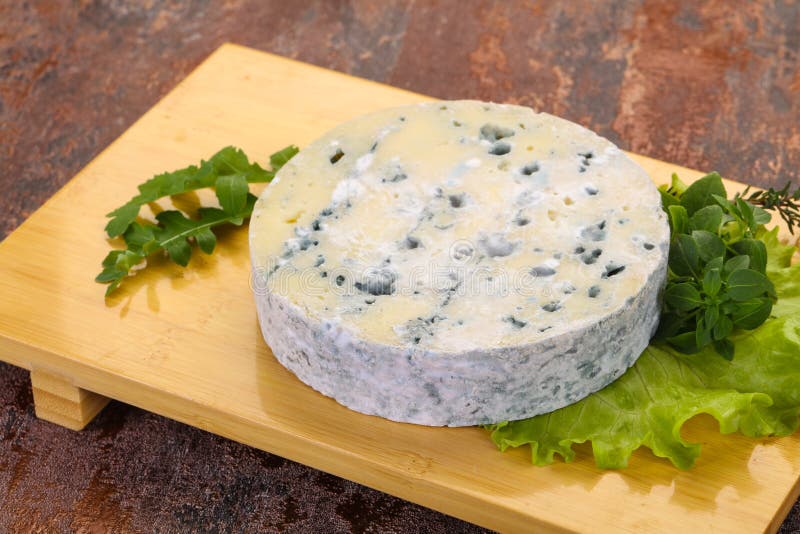 Round blue cheese stock photo. Image of rind, mature - 142631062
