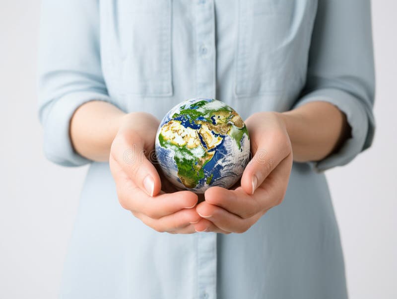 Round Blue Planet Earth with Continents in Caring Female Hands Stock ...