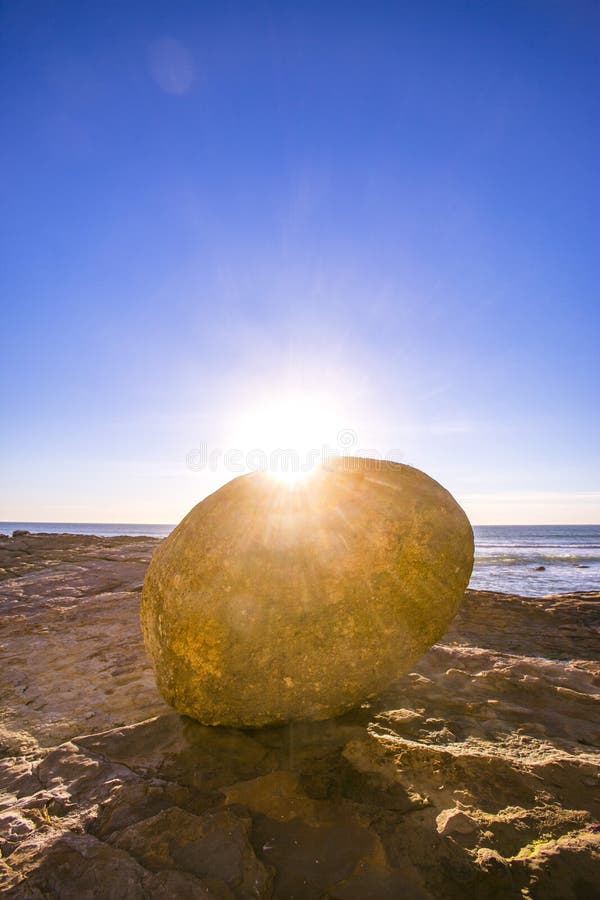 Round Boulder Right on the Shore Stock Image - Image of sunset, curves ...
