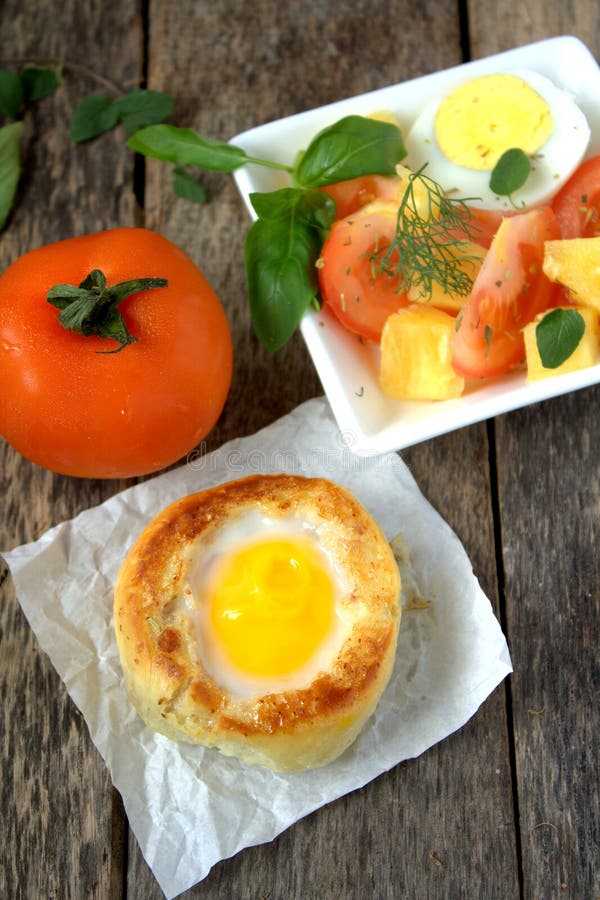 Round Bread Bun with Egg Inside Bun Stock Image - Image of morning ...