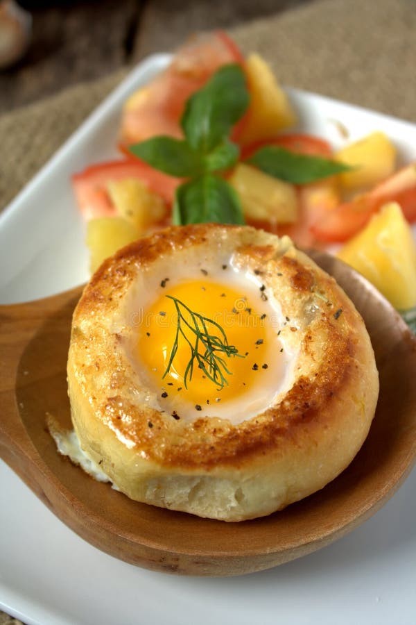 Round Bread Bun with Egg Inside Bun Stock Photo - Image of menu, meal ...