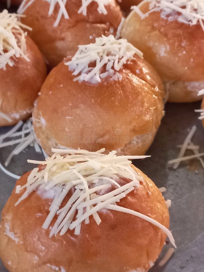 Round Bread with Cheese Topping Stock Photo - Image of round, bread ...
