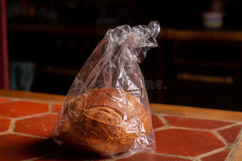 Round Bread in the Package on the Table in the House Stock Image ...