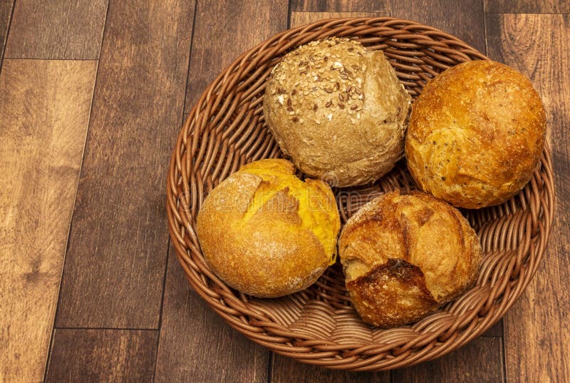 Round Bread Rolls of Different Flours in a Wicker Basket Stock Image ...