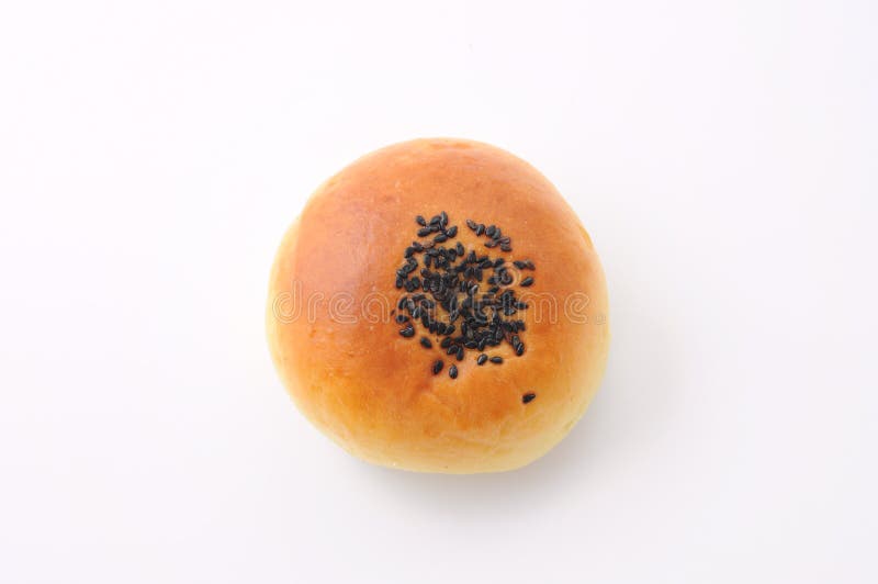 Round Bread with Sesame on Plate on Table Cutting Board Stock Photo ...