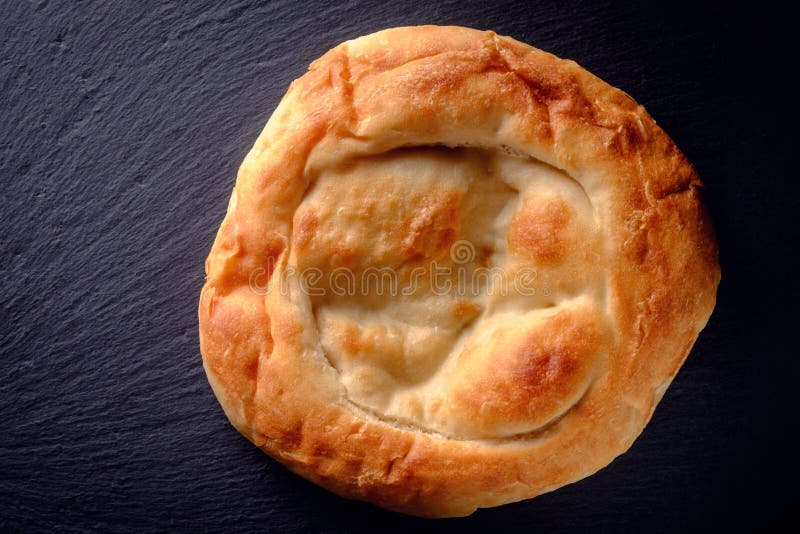 Round bread slate stock image. Image of golden, delicious - 69657463