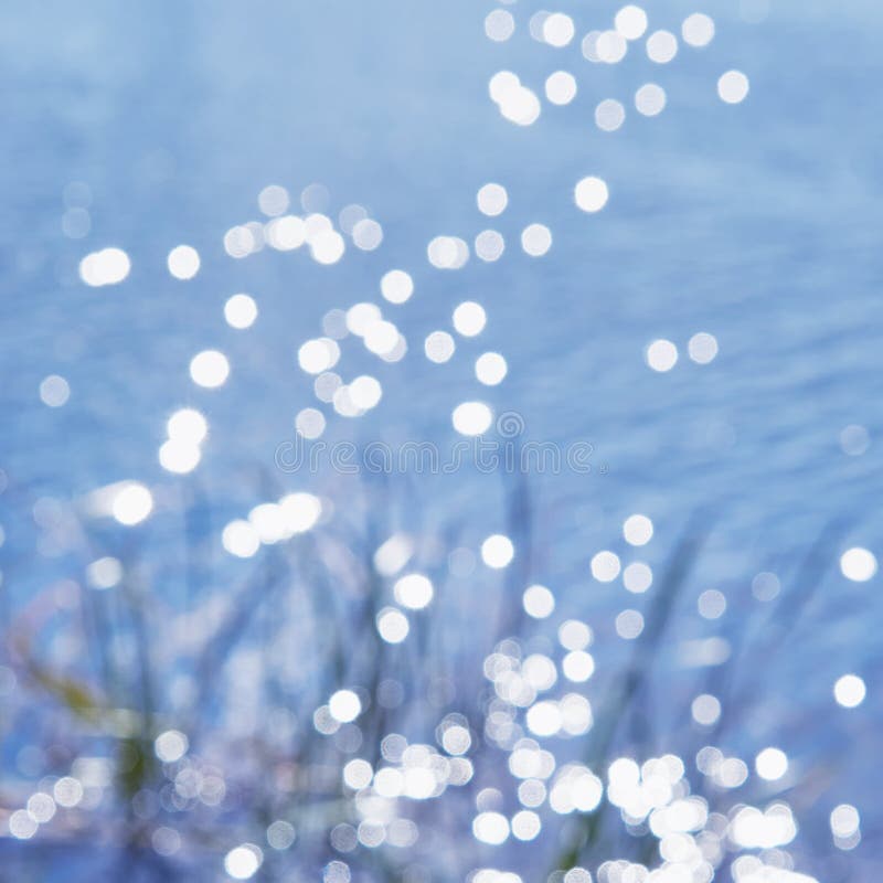 Round Bright Lens Flares with Water in the Background Stock Image ...