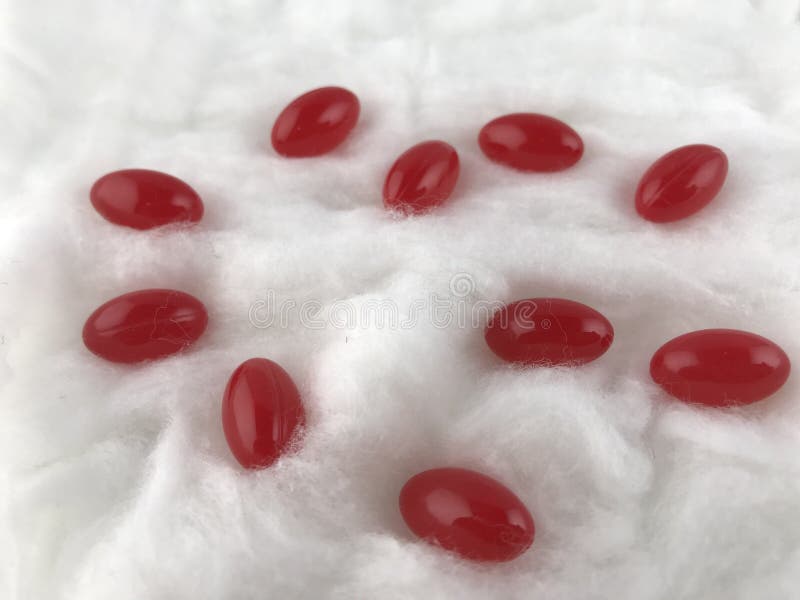 Round Bright Red Pill Placed on a White Background. Stock Photo - Image ...