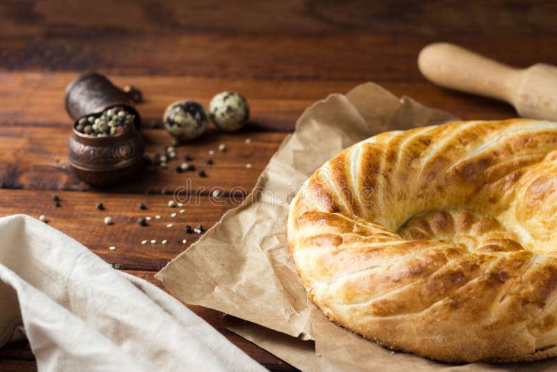 Round Cake of Bread on a Wooden Table with Spices, Home-made Bread ...