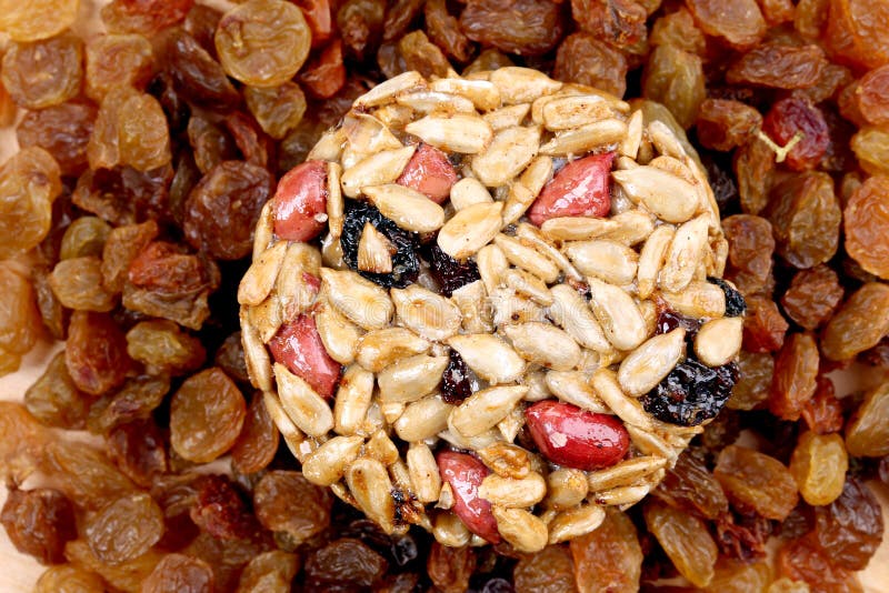 Round Candied Seeds and Nuts with Raisins. Stock Image - Image of ...