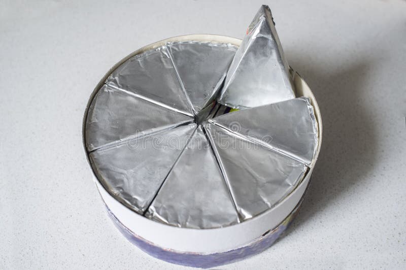 Opened Cardboard Box With Melted Cheese In Aluminium Foil Stock Photo ...