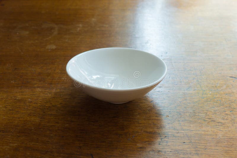 Round Ceramic Bowl on Wooden Table Stock Image - Image of dish ...