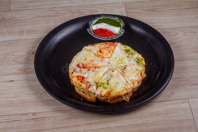 Round Cheese Burst Pizza Sandwich with Three Color Sauce Stock Image ...