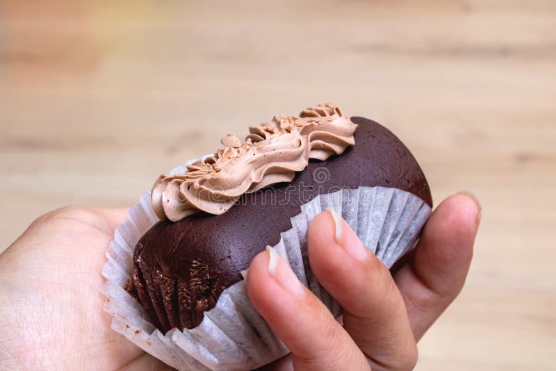 Round Chocolate Cake in Hand Close Up Stock Image - Image of hand ...