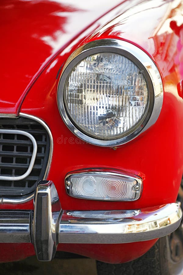 Round and Chrome Headlight on a Red Vintage Car Stock Photo - Image of ...