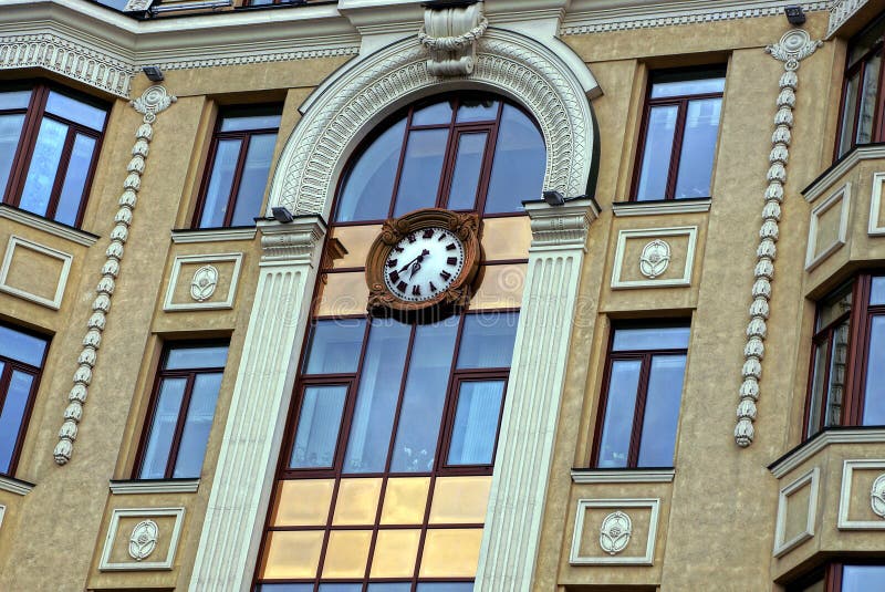 Round-the-clock on the Facade of a Modern Building with Windows Stock ...