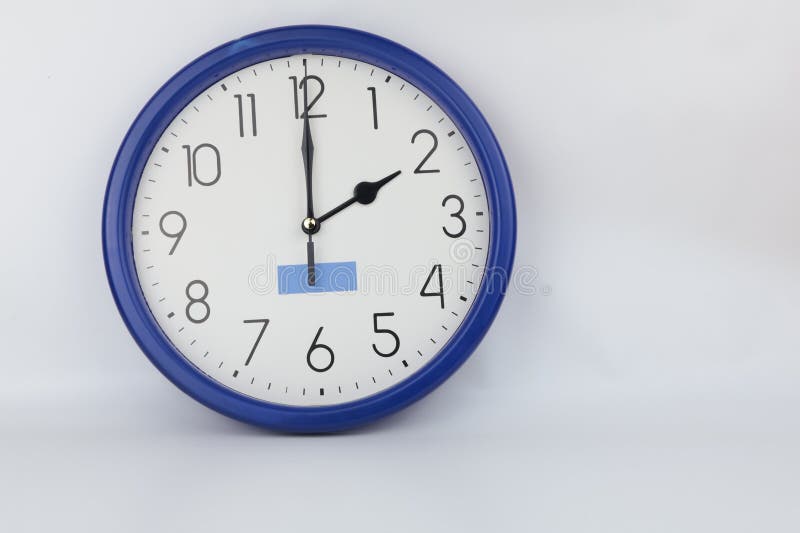Blue Wall Clock Stopped at 2 Stock Image - Image of blue, middle: 303255759