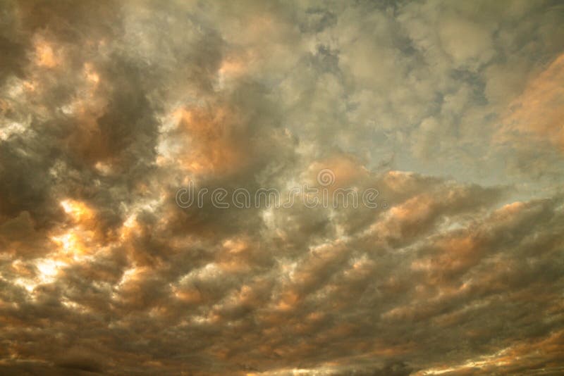 Round Clouds Illuminated by the Sunset Sun Stock Photo - Image of beach ...