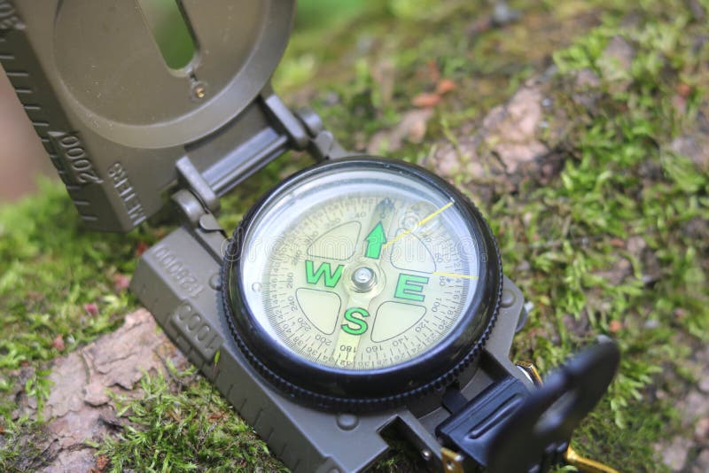 Round Compass on Natural Background Stock Photo - Image of forest ...