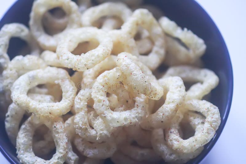Round Corn Rings Pile with Spices. Crunchy Puffed Snacks Close Up Stock ...