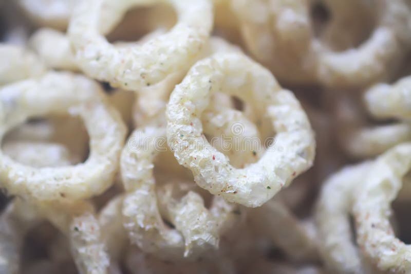 Round Corn Rings Pile with Spices. Crunchy Puffed Snacks Close Up Stock ...