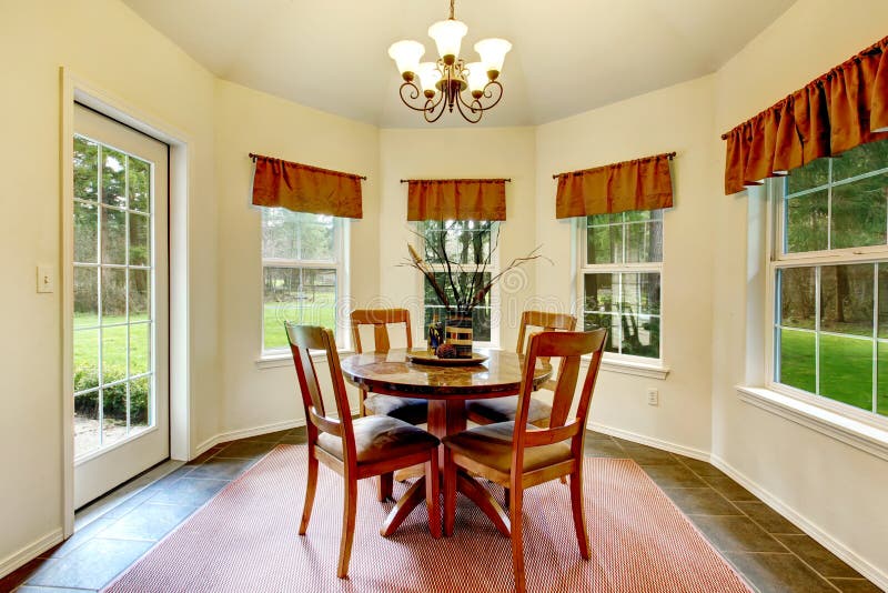Round Corner Dining Room with French Windows Stock Photo - Image of ...