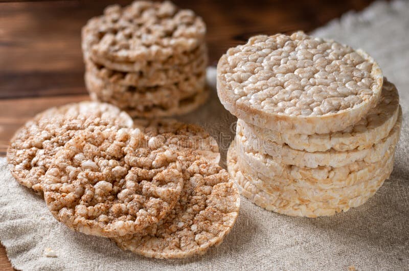 Round Crisp Breads on Wooden Background. Wheat Crispbreads Stock Image ...