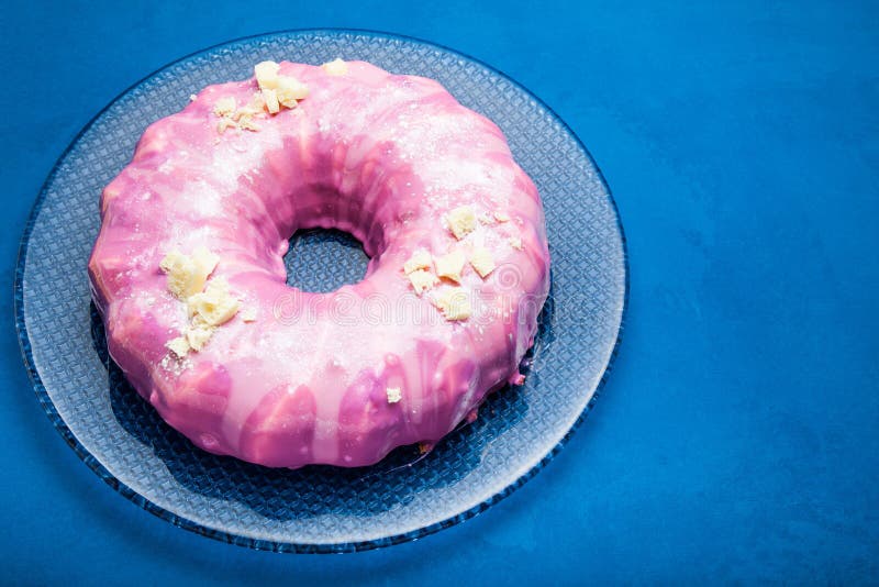 Round Curd Cake with Pink Icing and White Chocolate Stock Photo - Image ...
