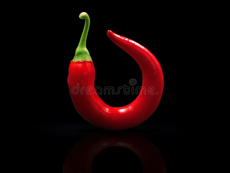 Round Curved Red Chili Pepper Isolated on Black Background Stock Photo ...