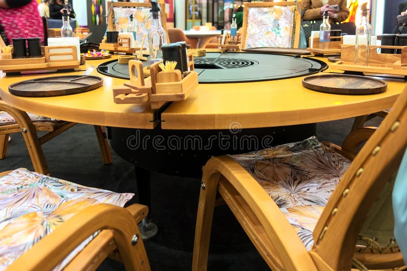 Round Dining Table with Round Grill Inside Stock Photo - Image of round ...