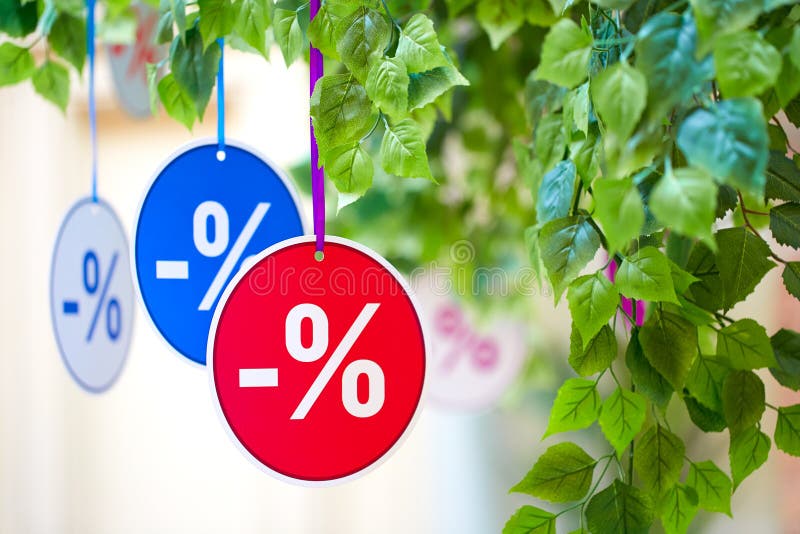 Round Discount Stickers on a Tree Stock Image - Image of offer, round ...
