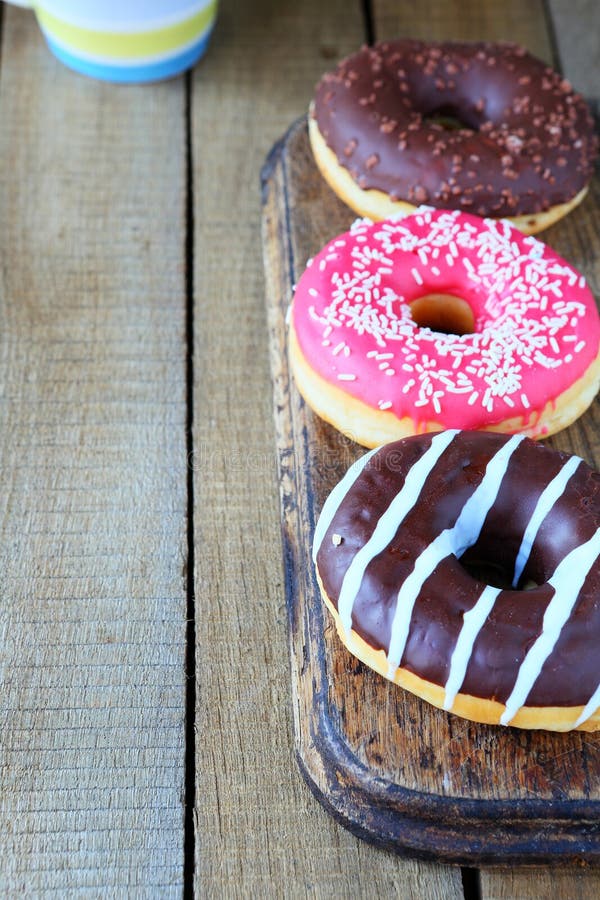 Round Donuts Covered with Powdered Sugar Lying in a Wicker Basket. they ...