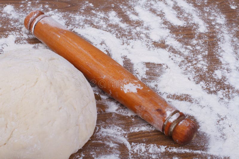 Round the Dough and Rolling Pin on Floured Table Stock Image - Image of ...