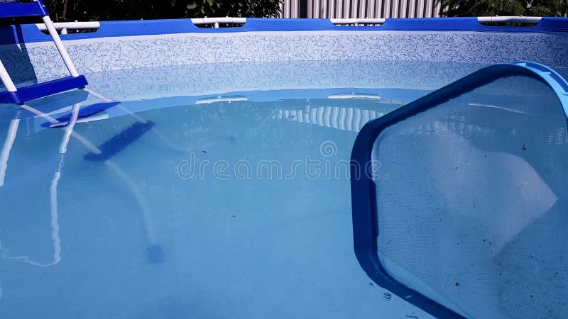 Round Frame Pool with Clean Water. Vacation in the Village in Summer ...