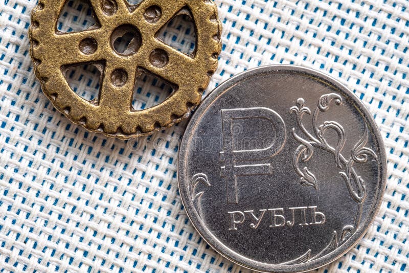 Round Gear and the Round Coin with Face Value of One Ruble on the ...